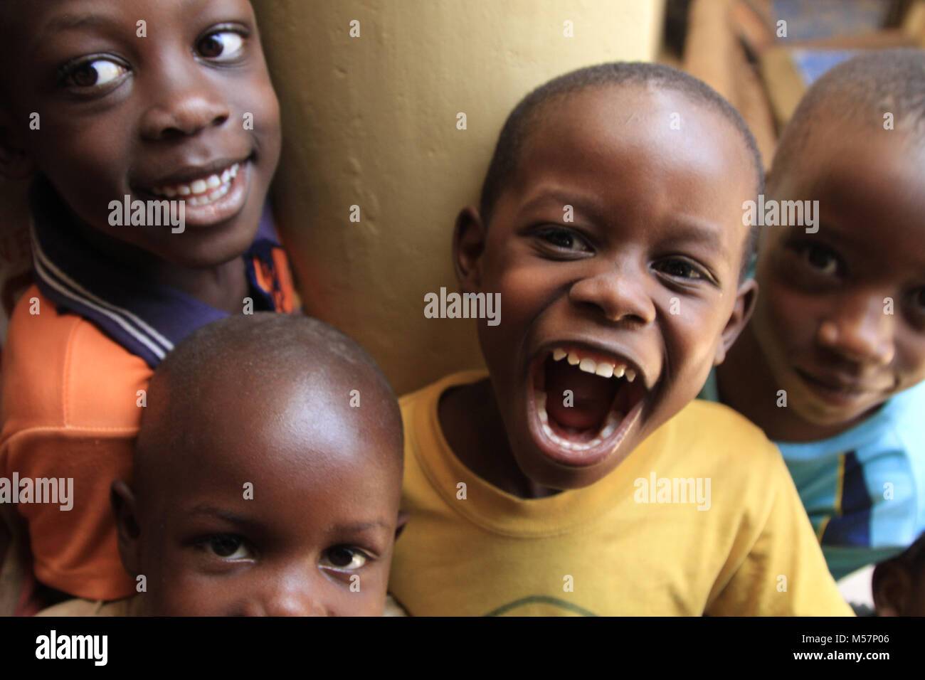 A boy with a joyous smile in Uganda Stock Photo - Alamy