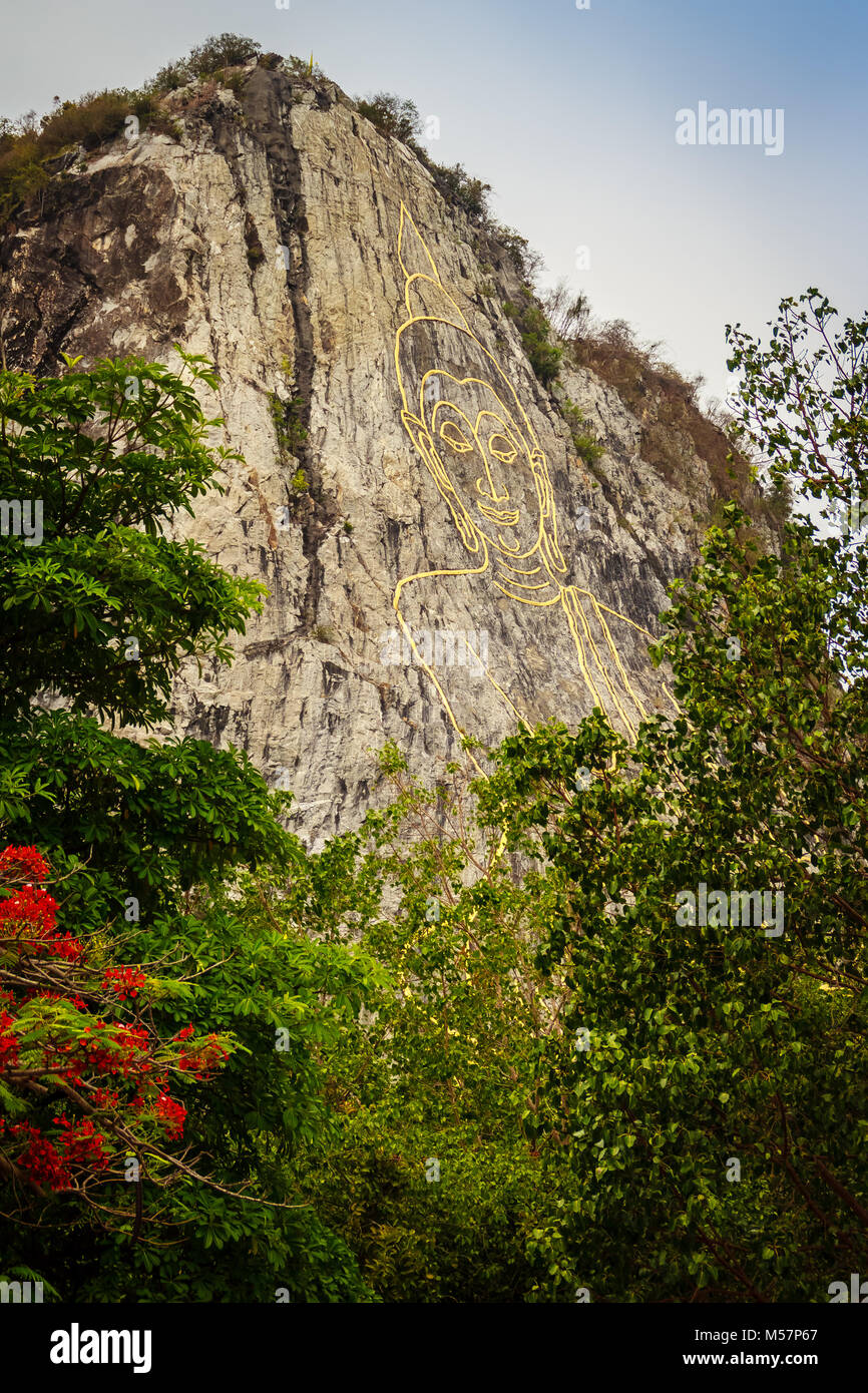 Golden Buddha laser carved and inlayed with gold on Khao Chee Chan ...