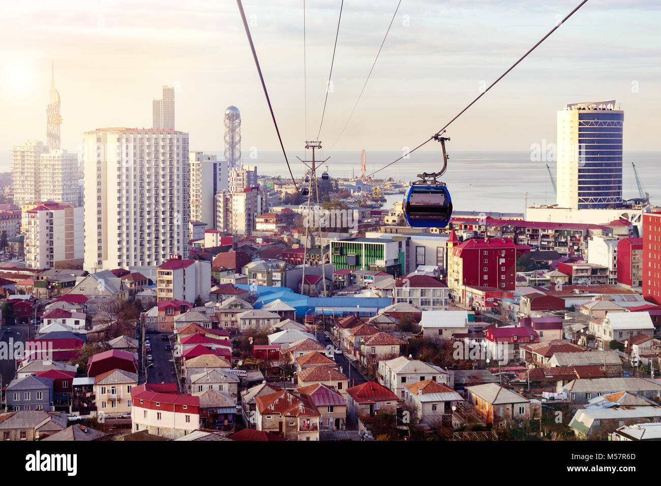 Aerial cableway above city roofs of Batumi, Georgia. Urban landscape ...