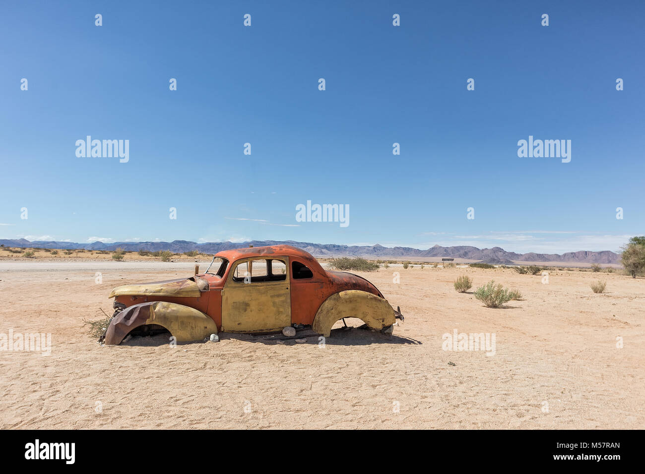 Old and abandoned car in the desert of Namibia, spot known as solitaire ...