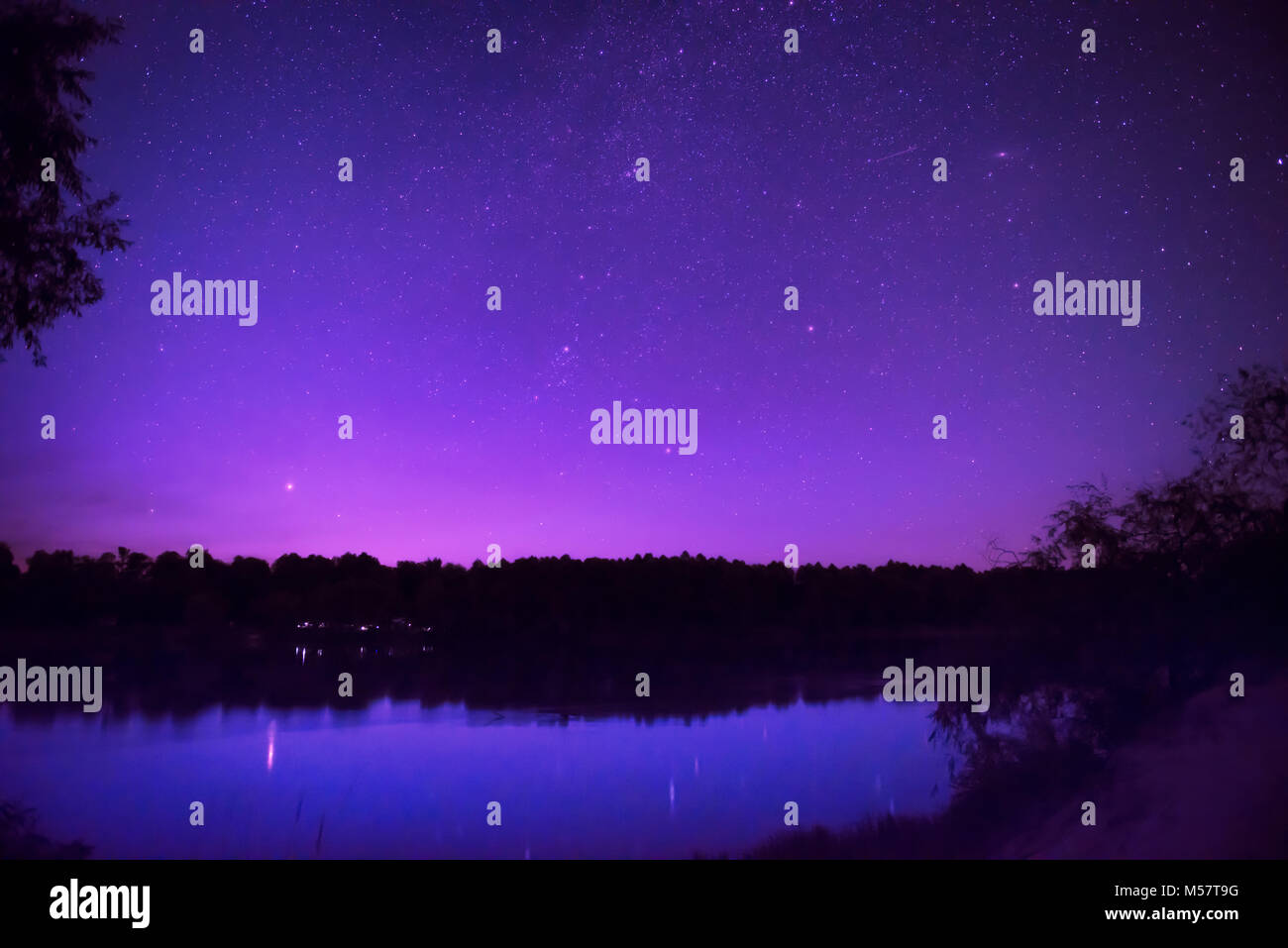 Beautiful night sky with many stars on a lake Stock Photo - Alamy