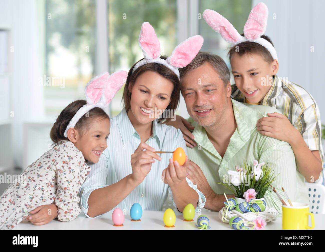 Happy easter children wearing bunny hi-res stock photography and images ...
