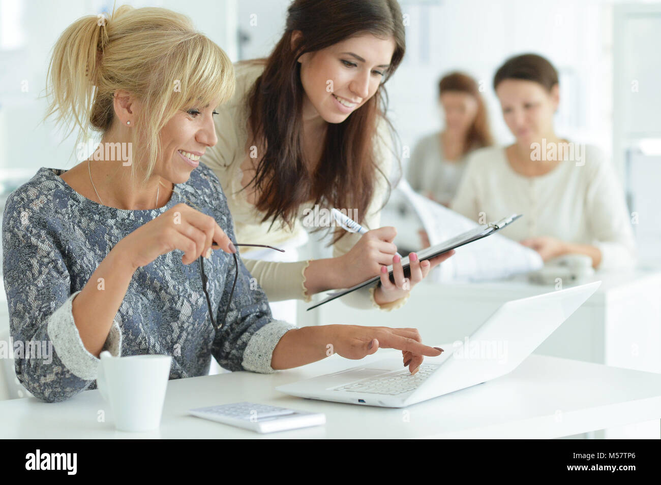 women working in office Stock Photo - Alamy