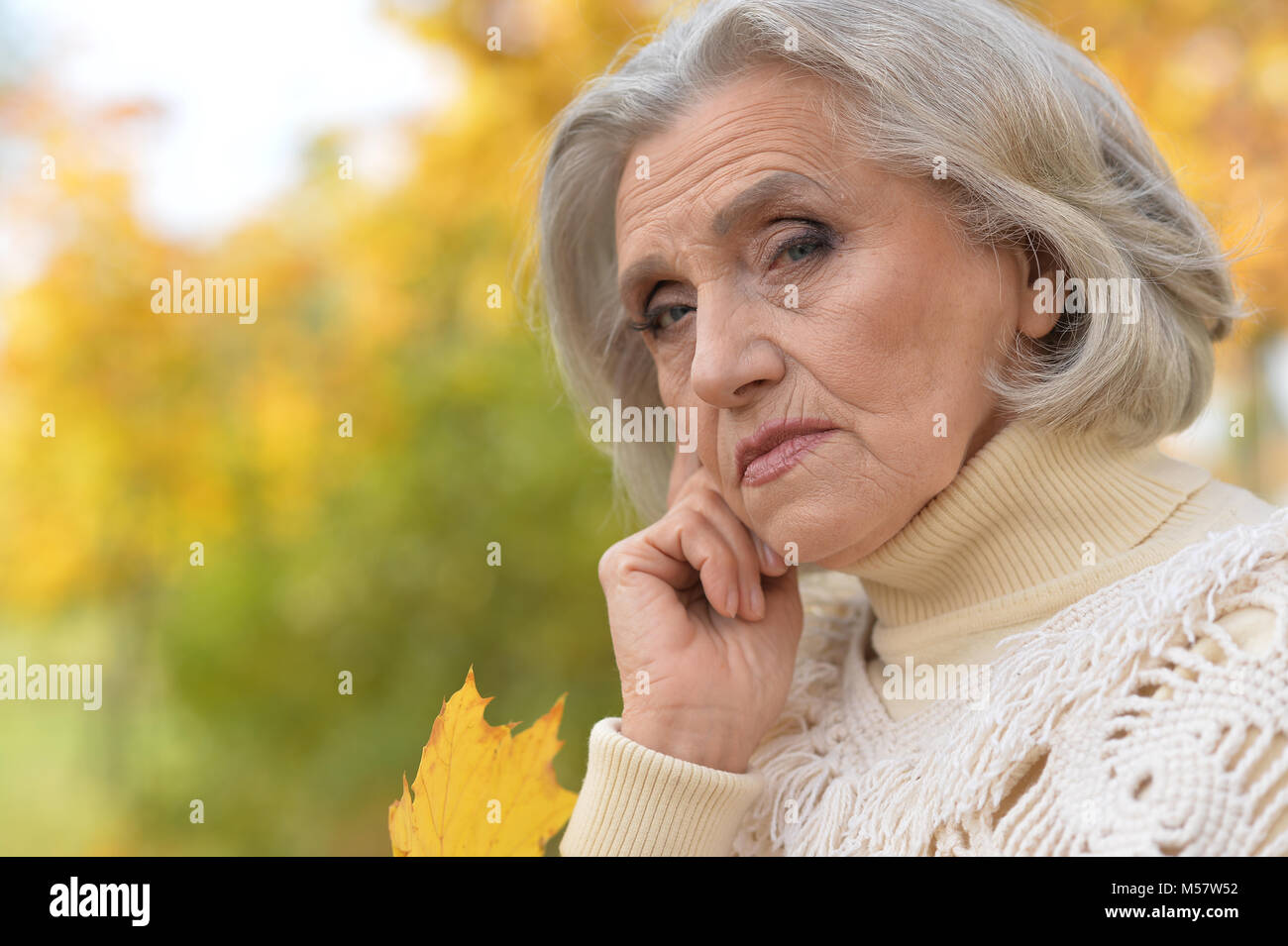 sad senior woman Stock Photo - Alamy