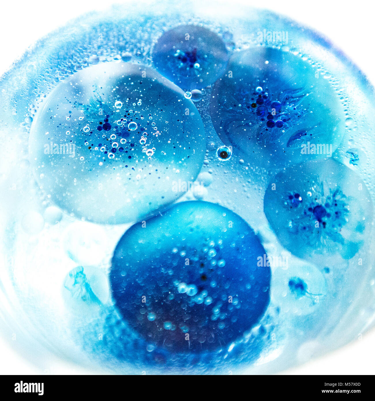 Abstract blue circle shapes and patterns made by adding colours to ...