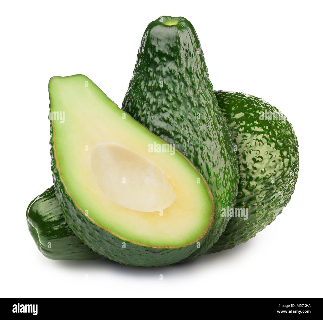Group of three green avocados isolated on white background, with ...