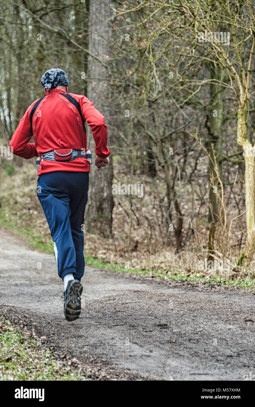 Male athlete runner in red hi-res stock photography and images - Alamy