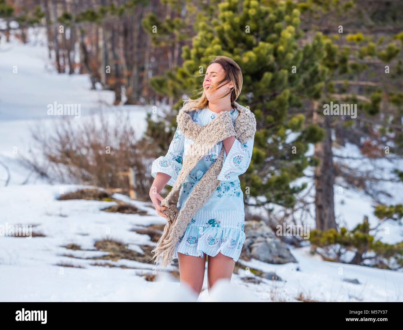 Young Woman Dress Blowing In Wind Stock Photos & Young Woman Dress ...