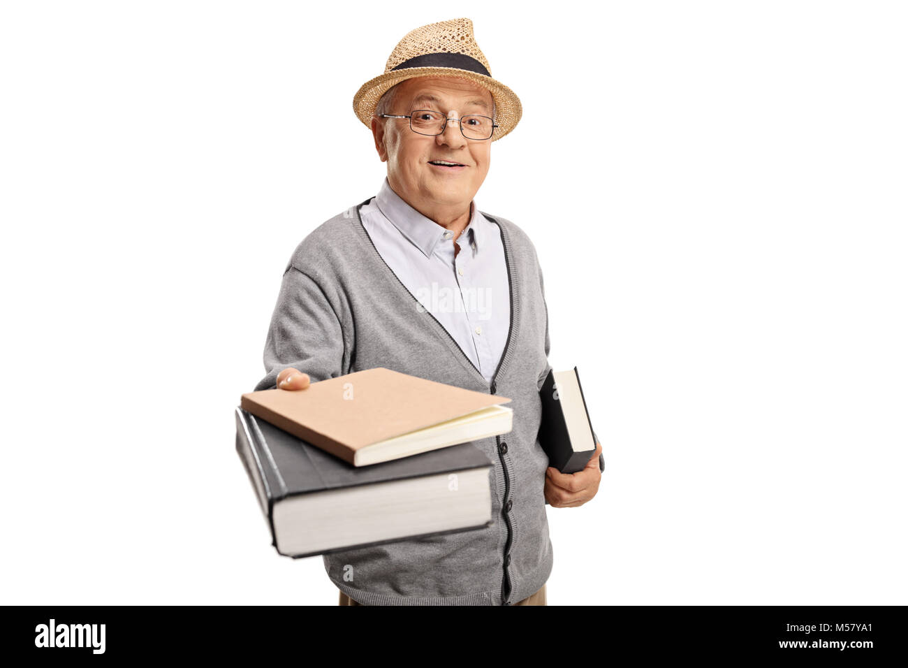 Mature man giving books isolated on white background Stock Photo - Alamy