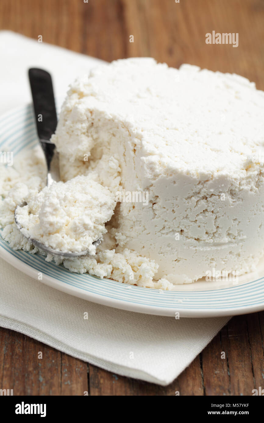 Ricotta, Italian cow milk whey cheese closeup Stock Photo - Alamy