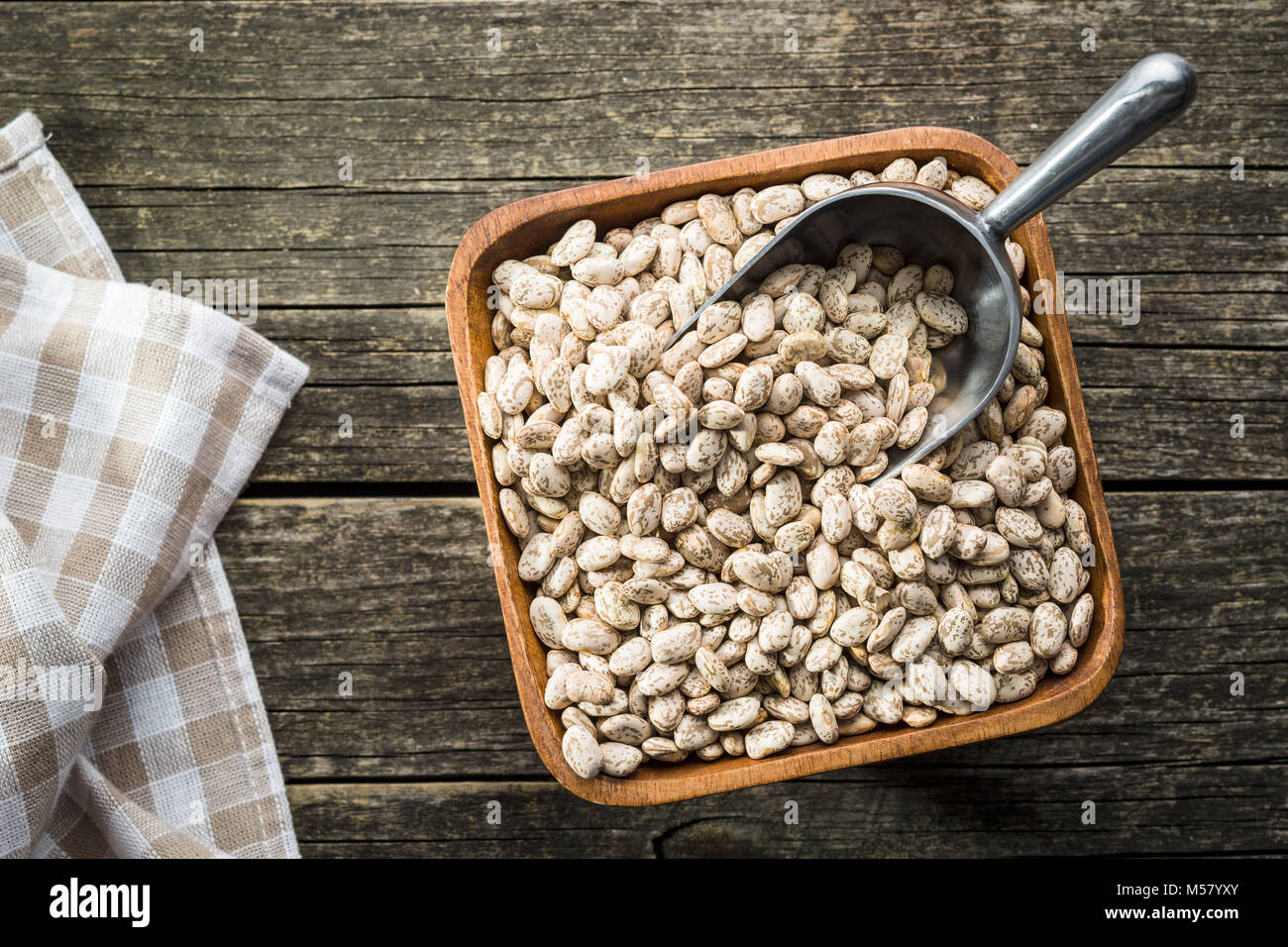 Dried borlotti beans in wooden bowl Stock Photo - Alamy