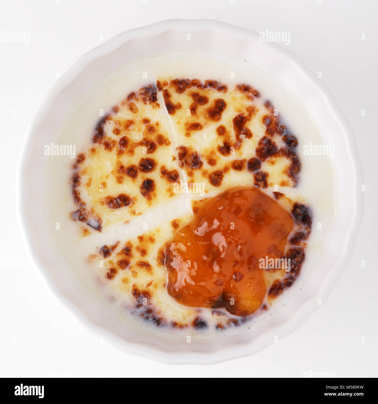 Finnish cheese Leipajuusto in milk with cloudberry jam closeup Stock ...