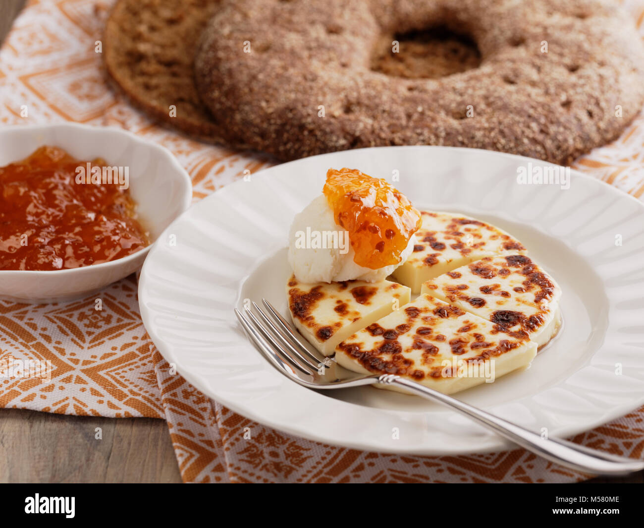 Finnish breakfast with mini farmer cheeses Leipajuusto, cloudberry jam ...