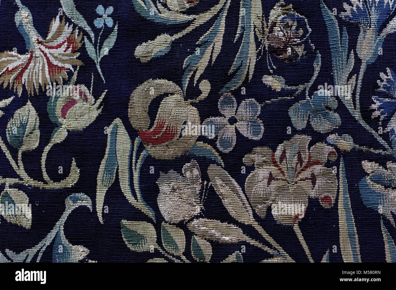 Old floral tapestry background in dark blue Stock Photo - Alamy