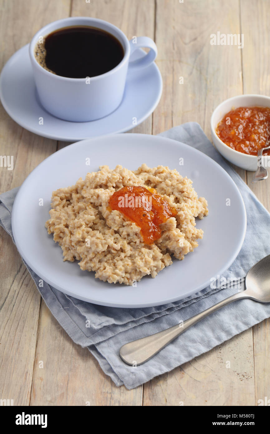 Oatmeal porridge with cloudberry jam Stock Photo - Alamy