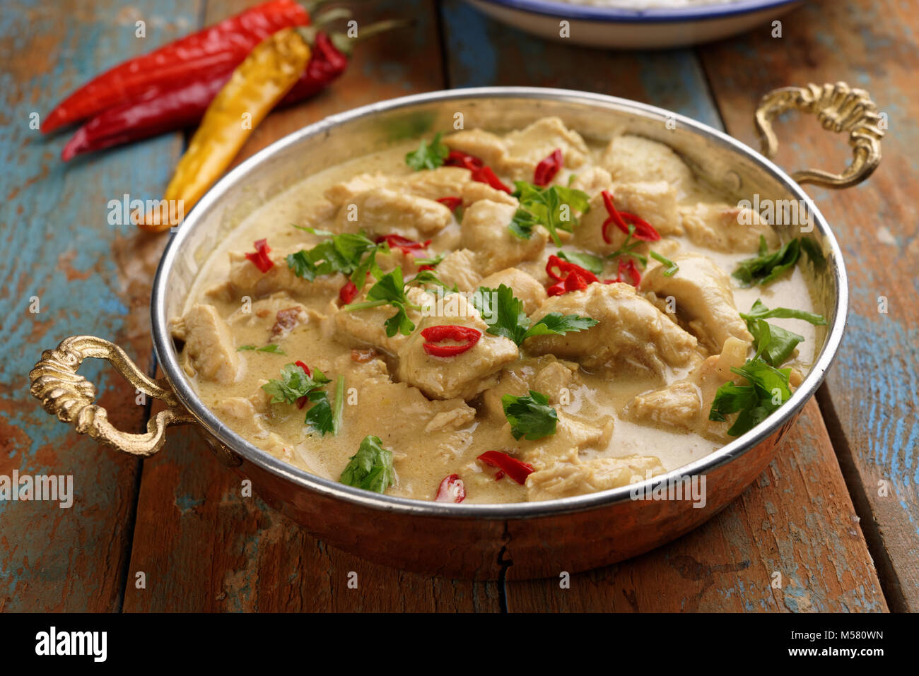 Chicken curry in a rustic cooking pan Stock Photo - Alamy