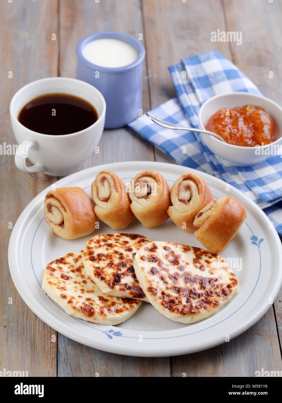 Finnish breakfast with squeaky cheese Leipajuusto, mini cinnamon buns ...
