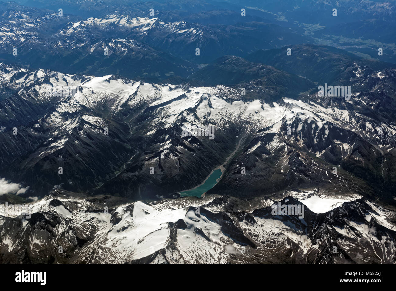 Aerial view to snowy Alpine landscape Stock Photo - Alamy