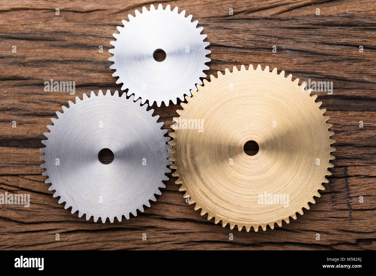 Interlocking gears hi-res stock photography and images - Alamy