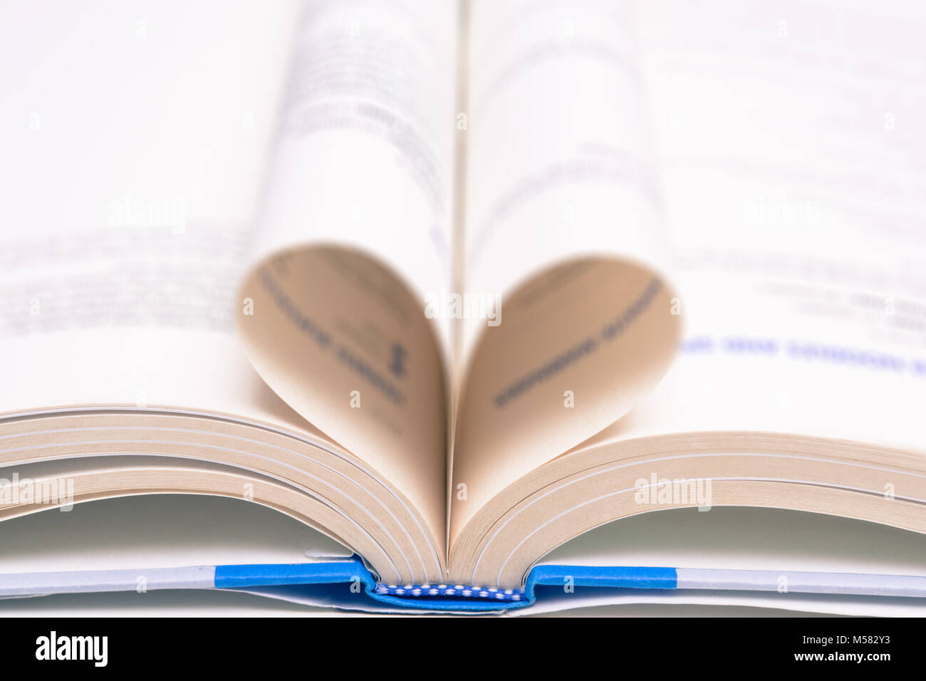 Open book folded pages hi-res stock photography and images - Alamy