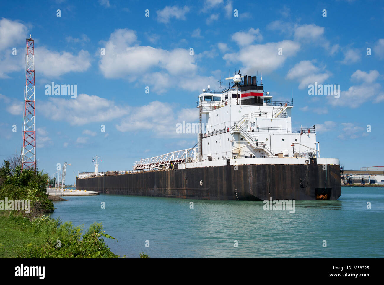 A lake freighter passing through the Welland Canal, Ontario, Canada ...