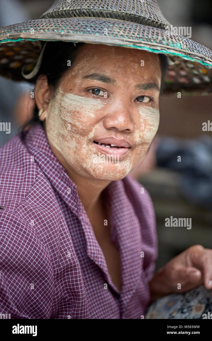 A woman in the Tahan Market in Kalay, a town in Myanmar. This market is ...