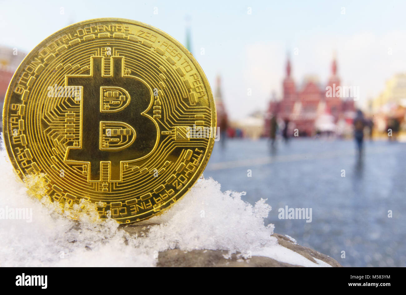 Gold coin bitcoin on the background of the Red Square and the Moscow ...