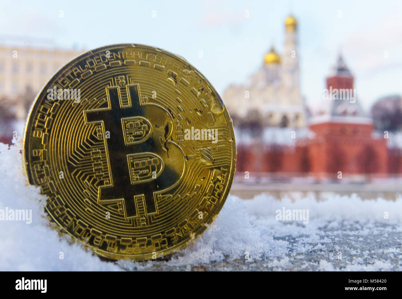 Gold coin bitcoin on the background of the Moscow Kremlin Stock Photo ...