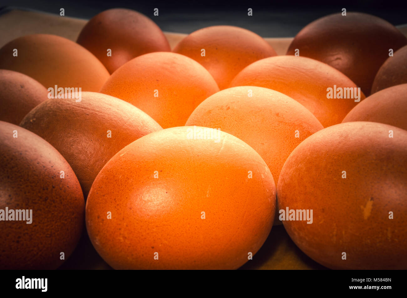 eggs colored with natural dye on brown dish Stock Photo - Alamy