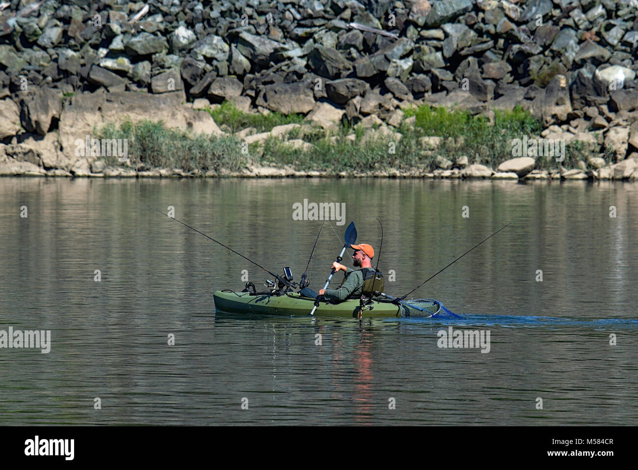 People fishing from boat in Susquehanna River near Conowingo Dam Stock ...