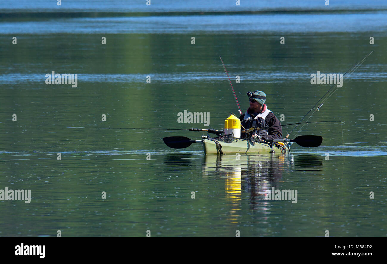 Man fishing from boat in Susquehanna River near Conowingo Dam Stock ...
