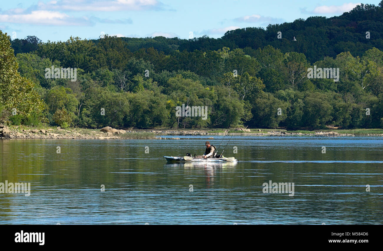 People fishing from boat in Susquehanna River near Conowingo Dam Stock ...