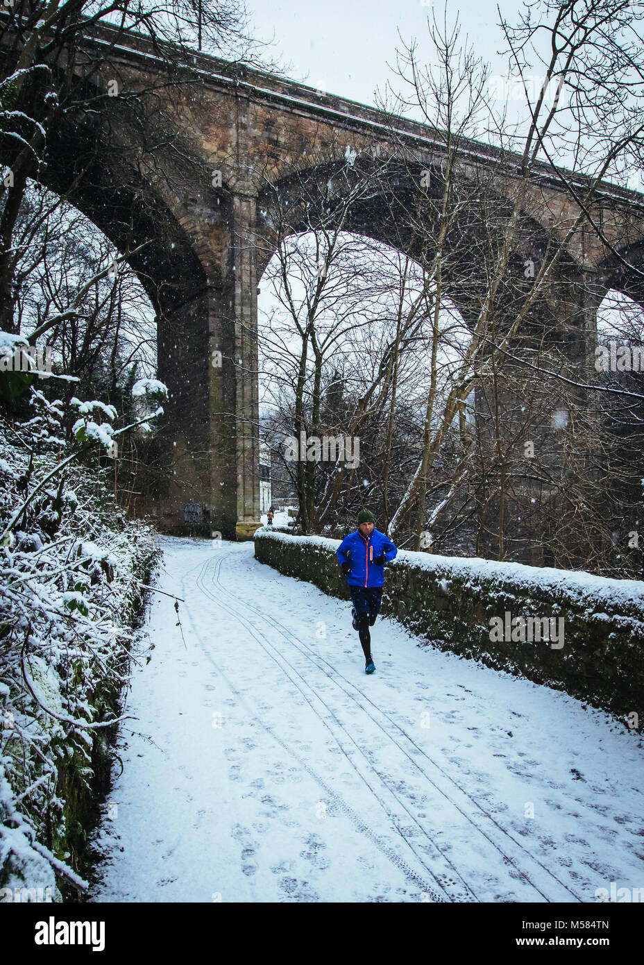 Running on a snow path hi-res stock photography and images - Alamy