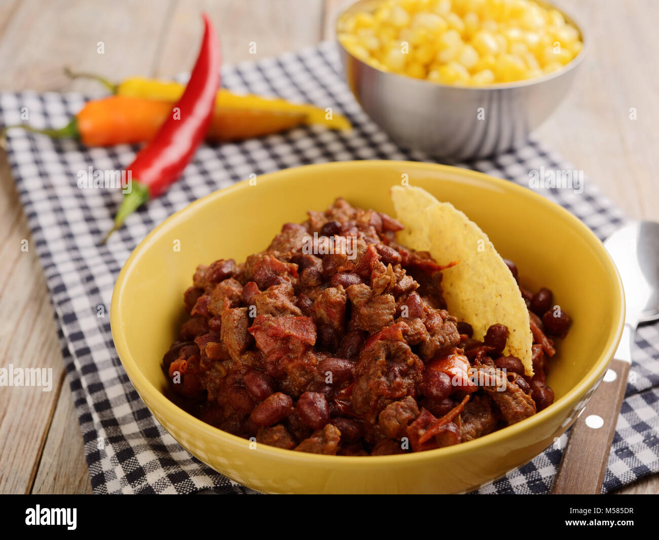 Chili con carne with corn and corn chips Stock Photo - Alamy