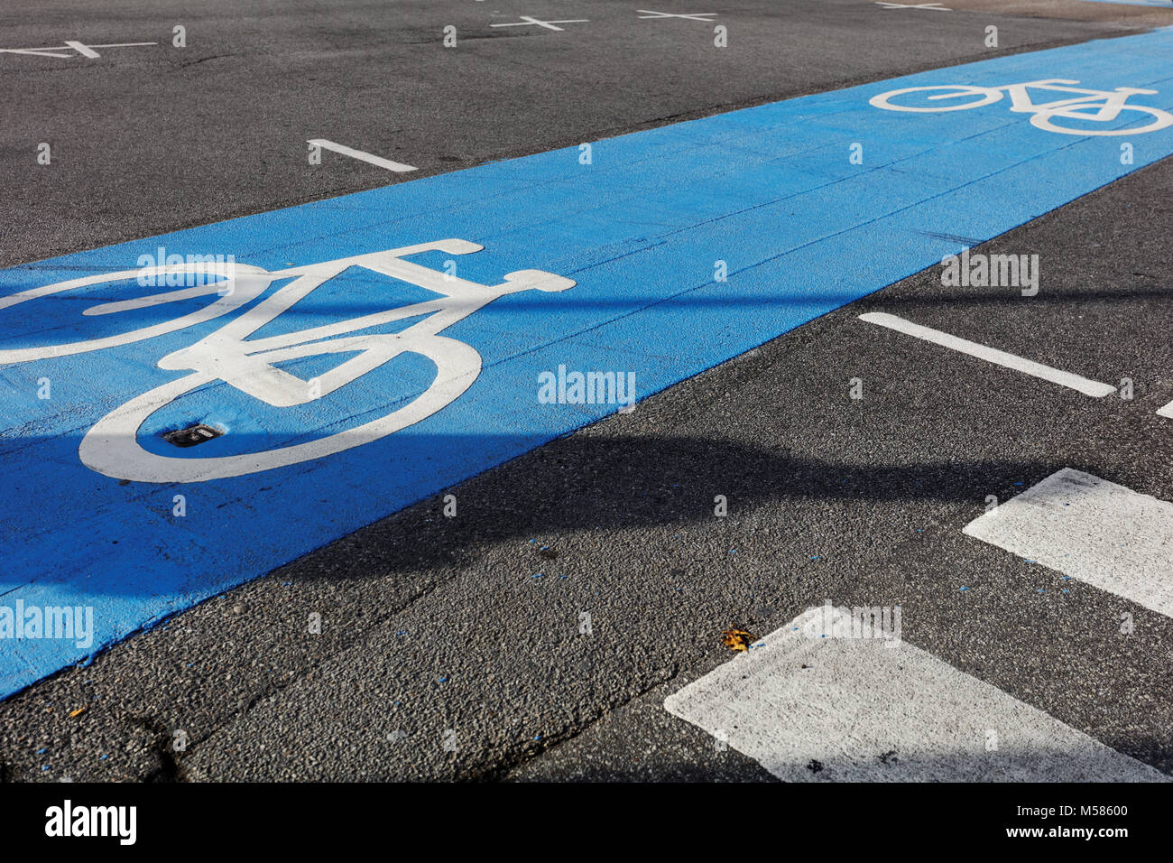 Marked in blue cycling path Stock Photo - Alamy