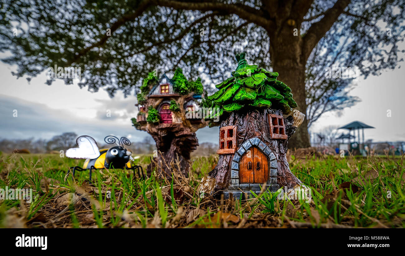 Giant bumble bee walks past woodland creature's house Stock Photo - Alamy