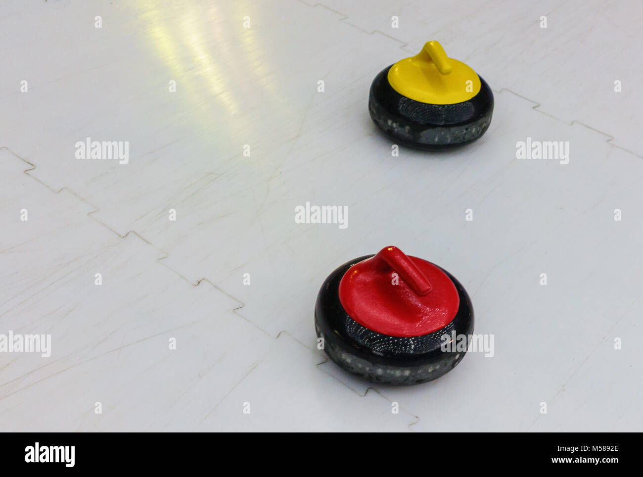Red curling stones hi-res stock photography and images - Alamy