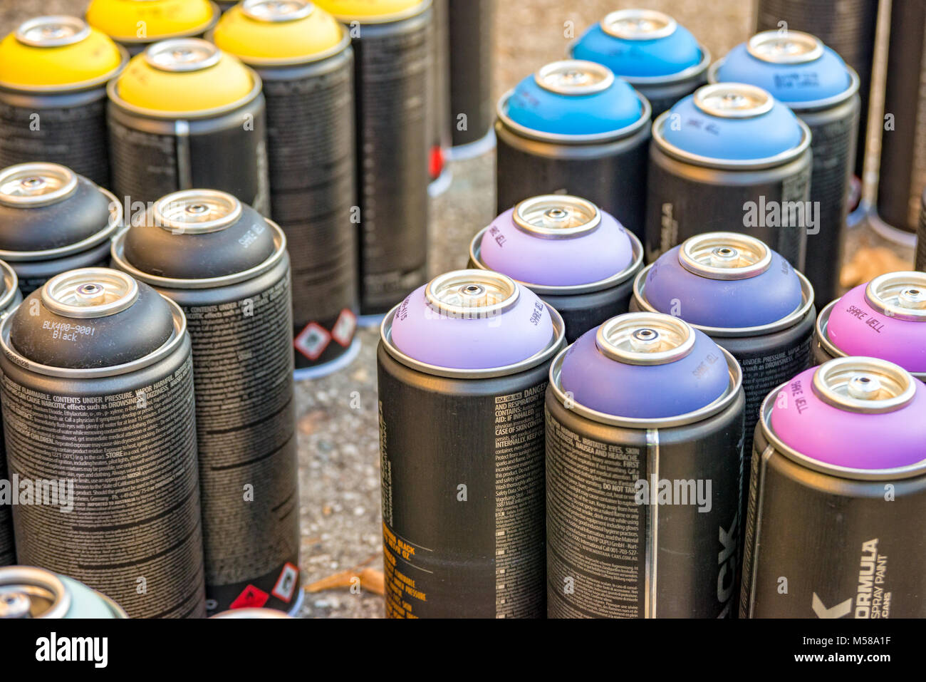 Different spray cans with different colors Stock Photo - Alamy
