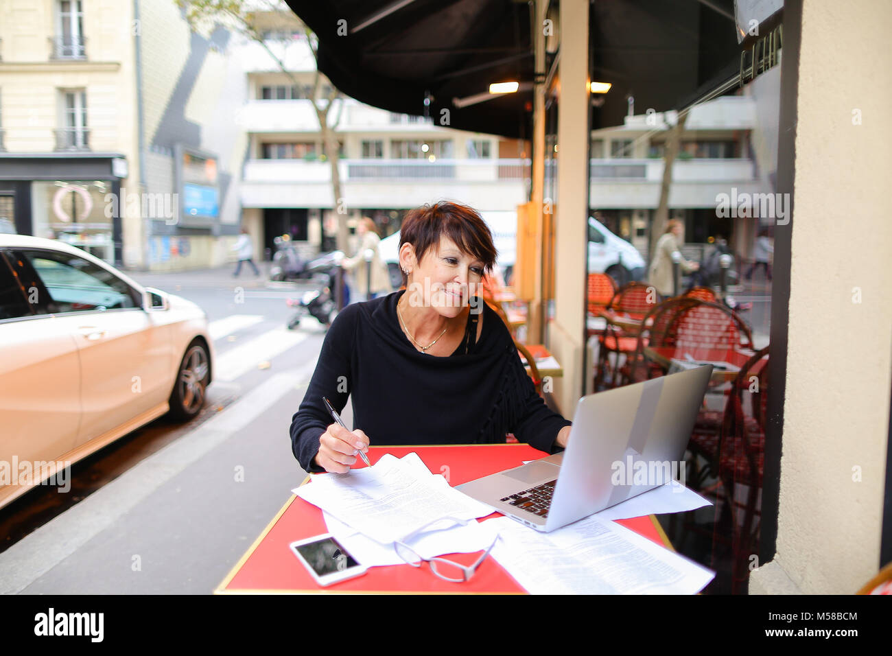 Female accountant remotely working in modern laptop Stock Photo - Alamy