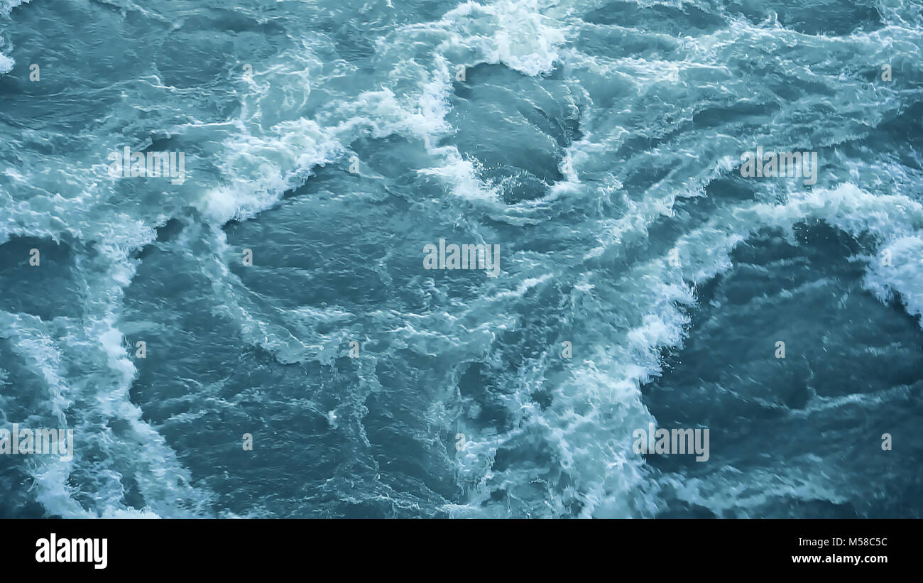 Water bubbles and creating small waves Stock Photo - Alamy