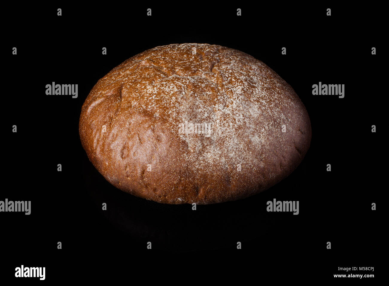 Bread on a dark background.Loaf Stock Photo - Alamy