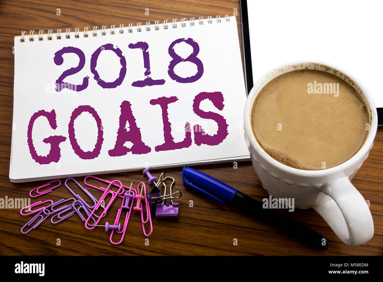 Goals 2018 - message appearing behind ripped brown paper. Targets, goal ...