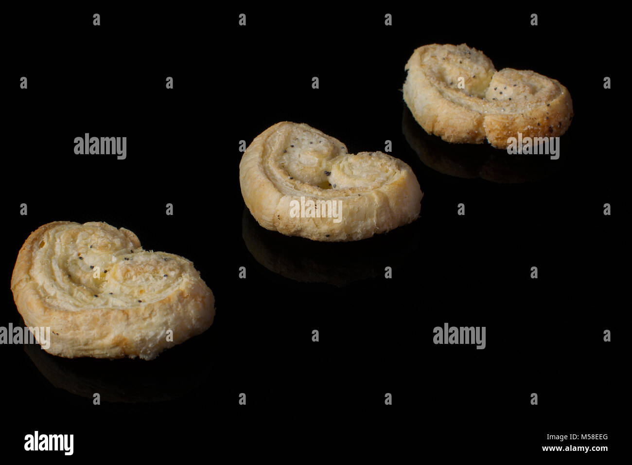 Puff pastry cookies ears hi-res stock photography and images - Alamy