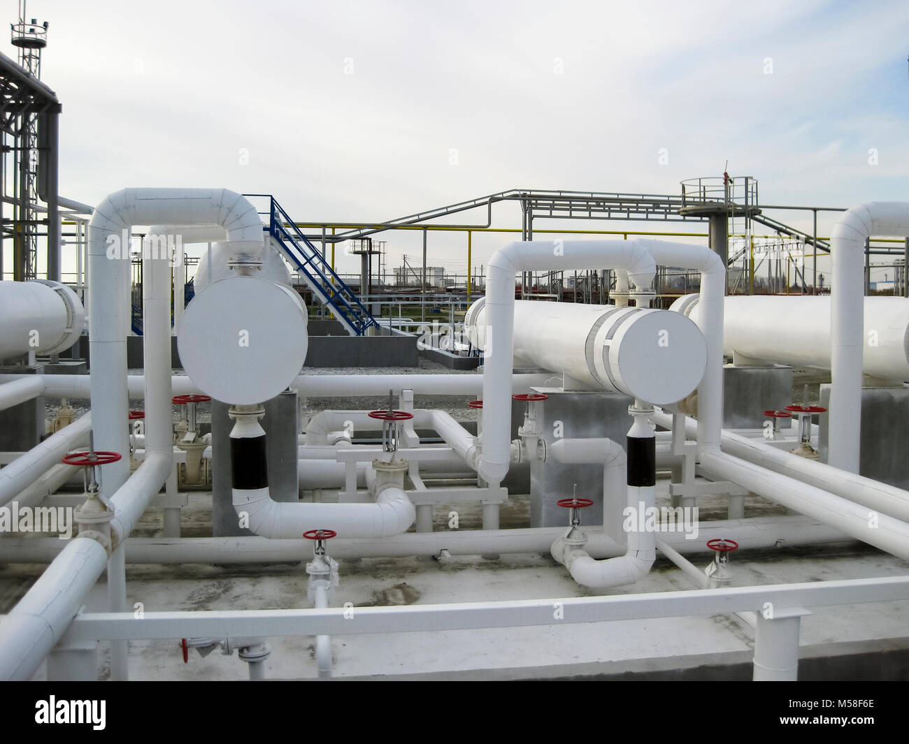 Heat exchangers in a refinery. The equipment for oil refining Stock ...
