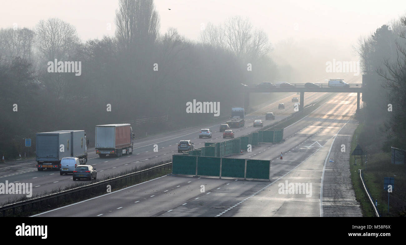 Traffic on the M20 in Kent passes a screen on the adjacent carriageway ...