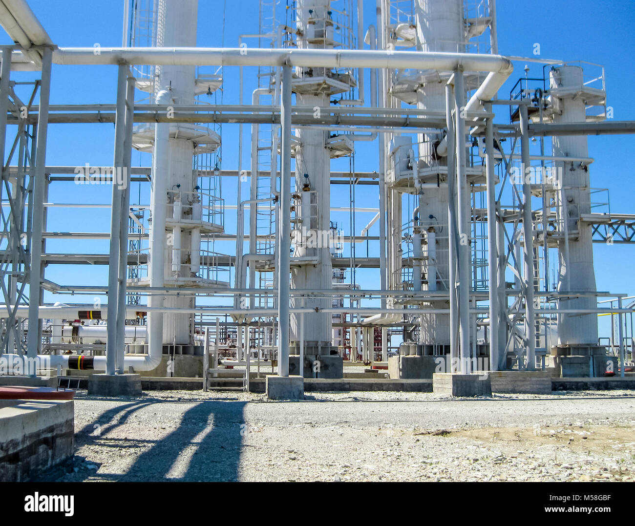 Rectification columns of the oil refinery. Refinery equipment. Oil ...