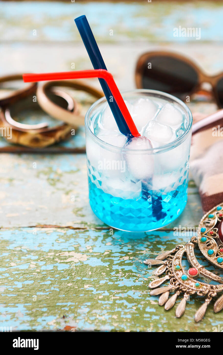 Cocktail Blue lagoon on the table background. Close up Stock Photo - Alamy