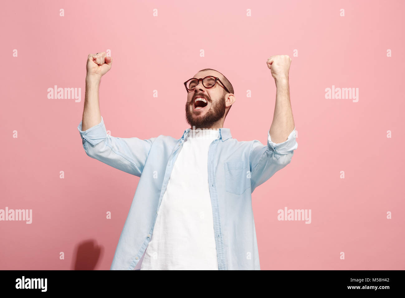 Winning success man happy ecstatic celebrating being a winner. Dynamic ...