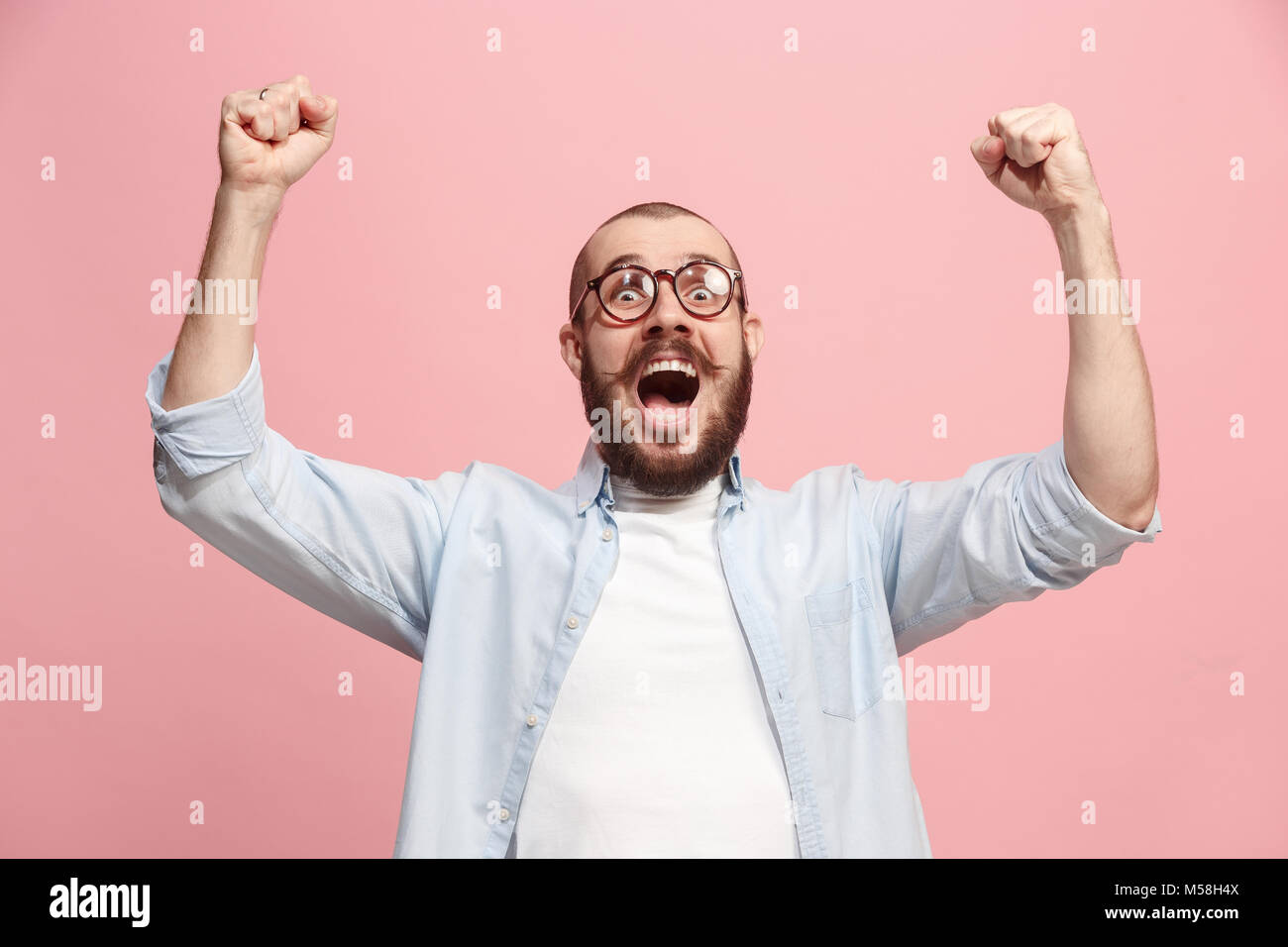 Winning success man happy ecstatic celebrating being a winner. Dynamic ...