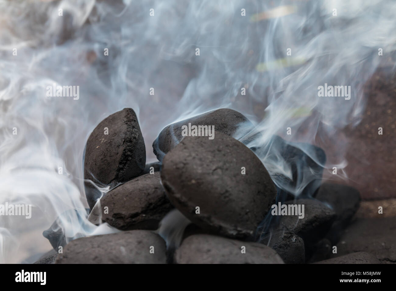 Fire briquettes hi-res stock photography and images - Alamy